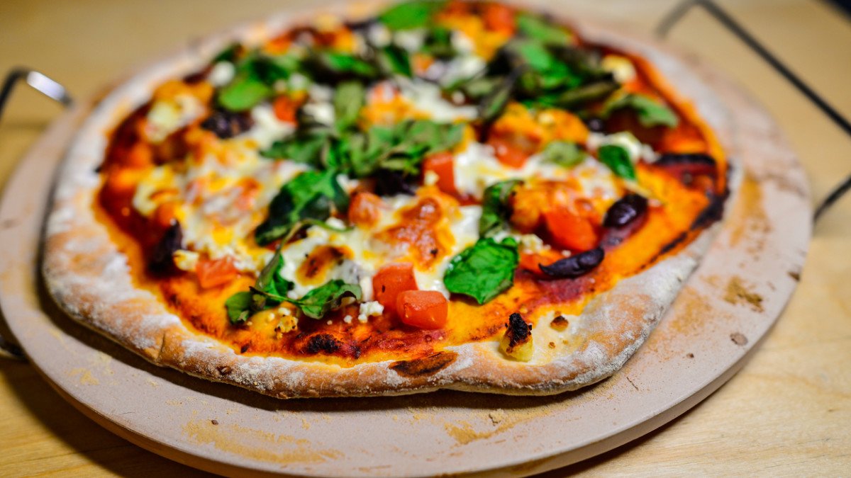 How to Clean Burnt Cheese off Pizza Stone: Easy & Effective Tips ...